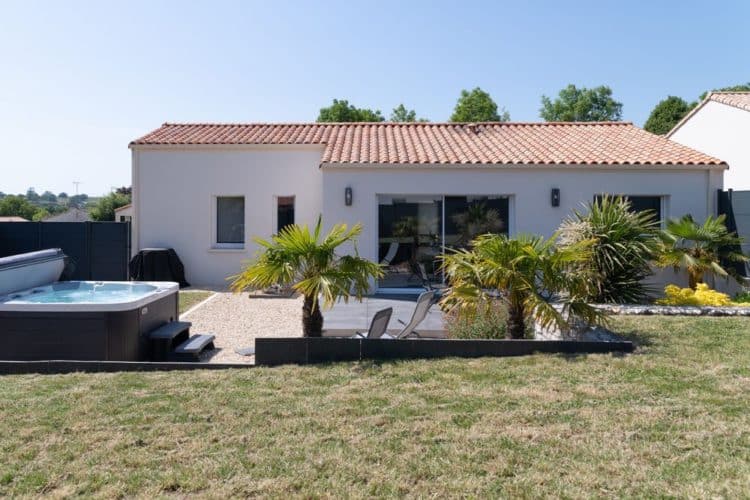 Cocon familial de 95 m² avec 2 belles chambres et un dressing - Maisons d'en France Atlantique